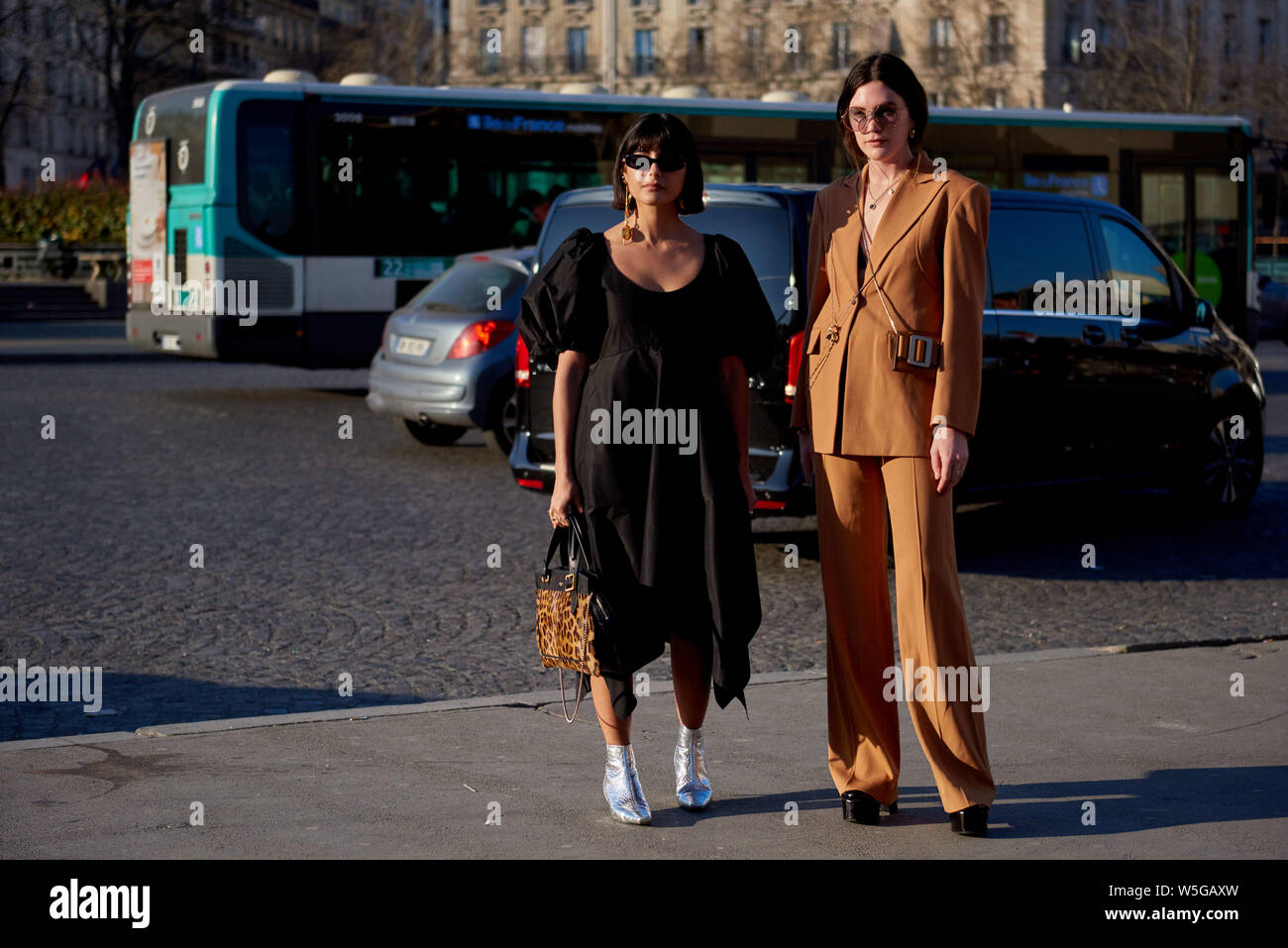 A trendy woman poses for street snaps during the Paris Fashion Week ...