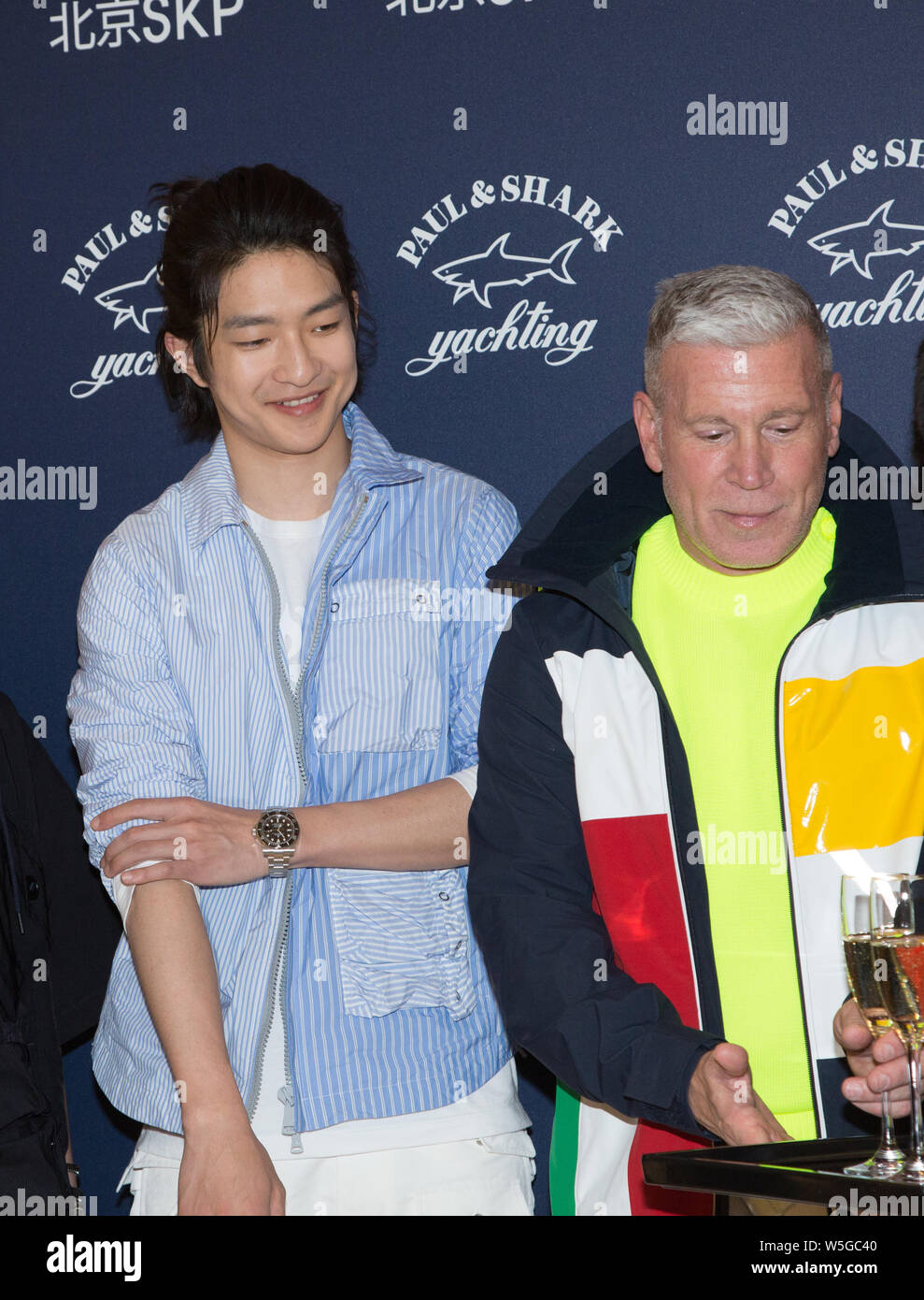 American fashion consultant Nick Wooster, right, and Chinese actor Qu ...