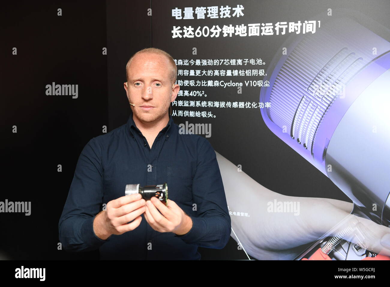 Kevin Grant, Head of Floorcare at Dyson in Southeast Asia, demonstrates ...