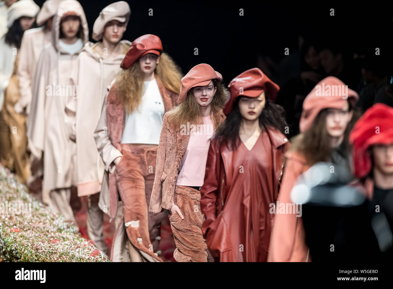 Models display new creations at the fashion show of WAN HUNG during the ...