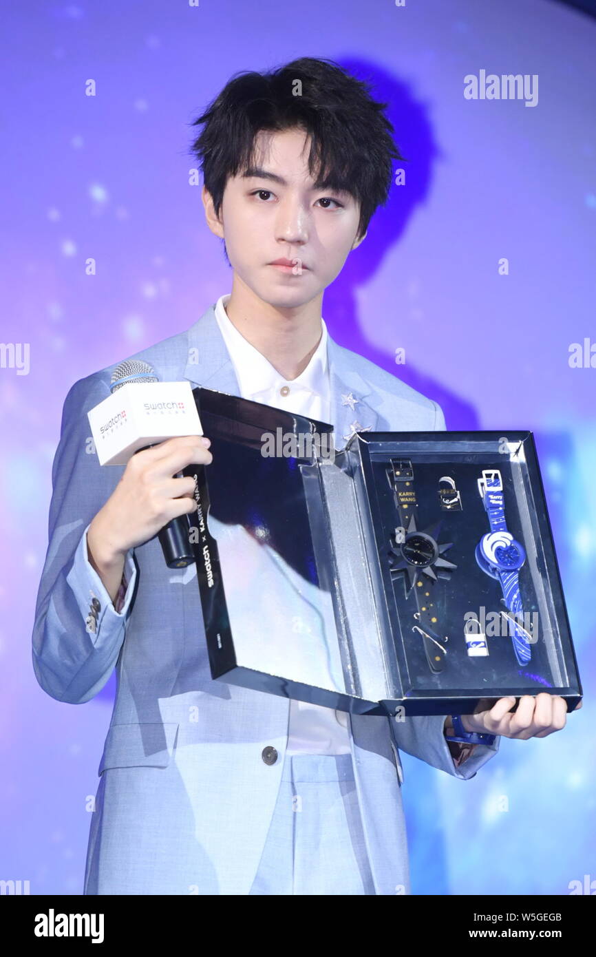 Karry Wang Jun Kai of Chinese boy group TFBoys attends a promotional ...