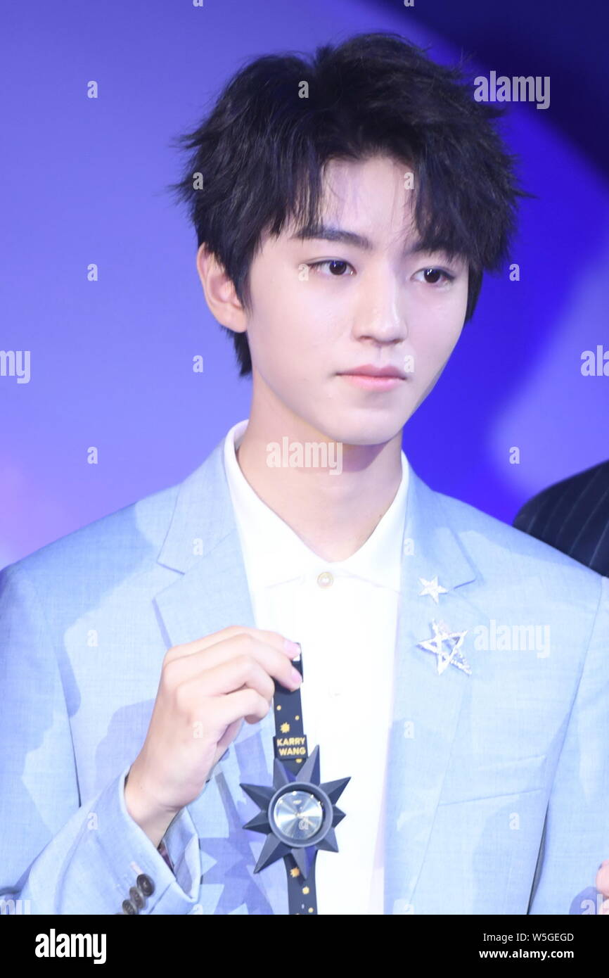 Karry Wang Jun Kai of Chinese boy group TFBoys attends a promotional ...