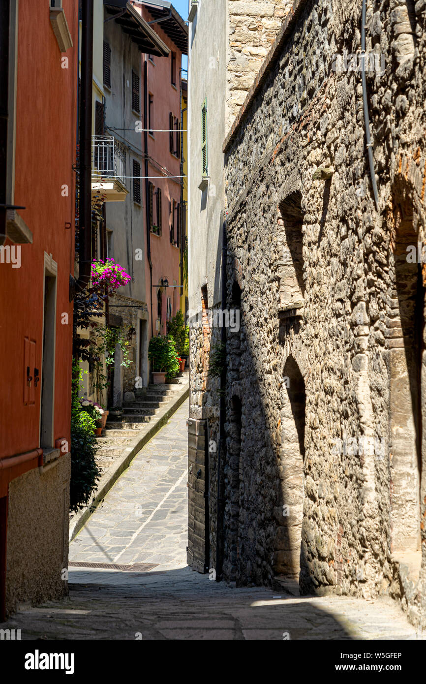 Varzi, Pavia, Lombardy, Italy: old typical street with colorful houses ...