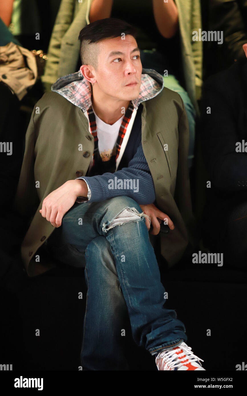 Hong Kong-Canadian actor and rapper Edison Chen watches models ...
