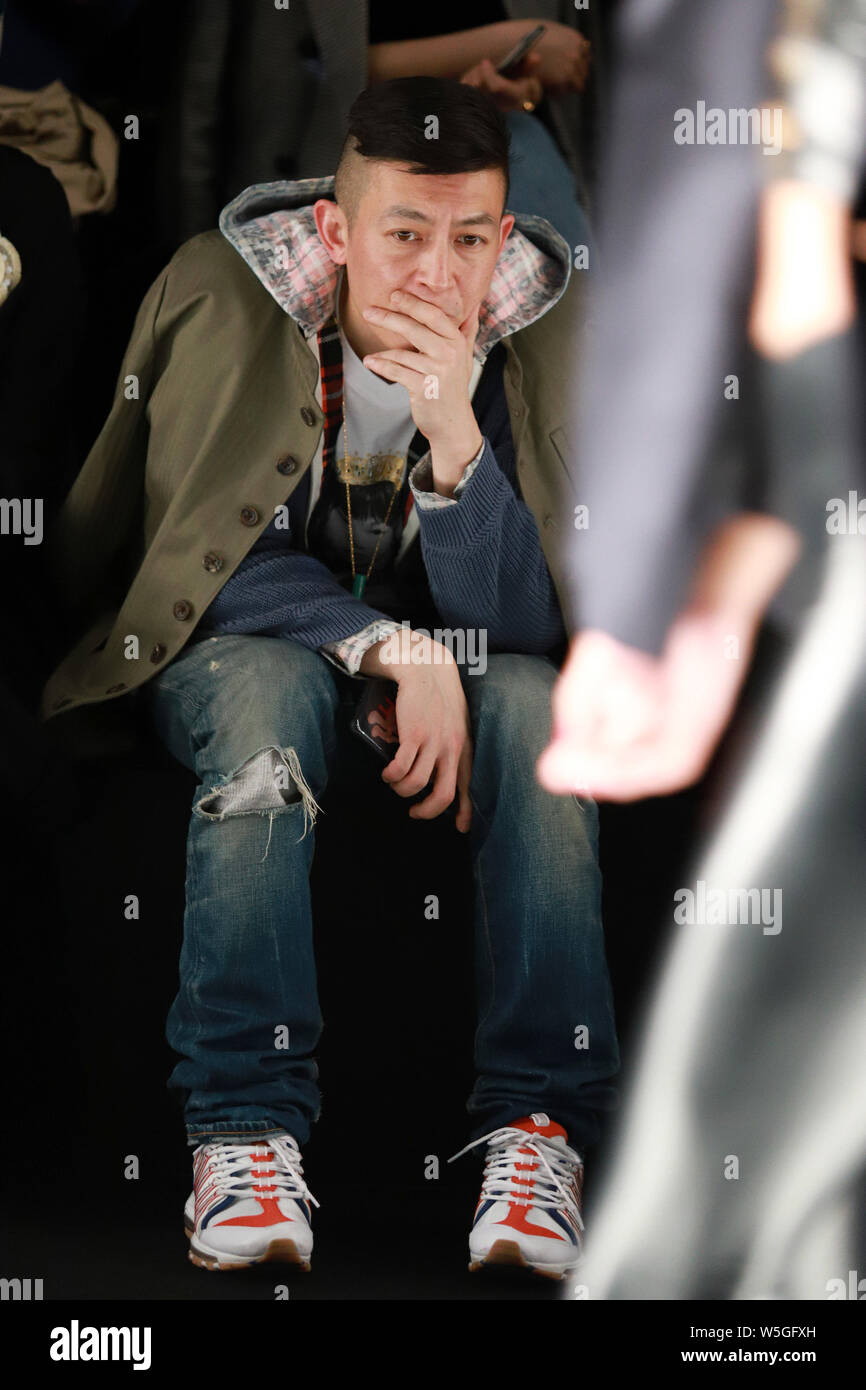 Hong Kong-Canadian actor and rapper Edison Chen watches models ...