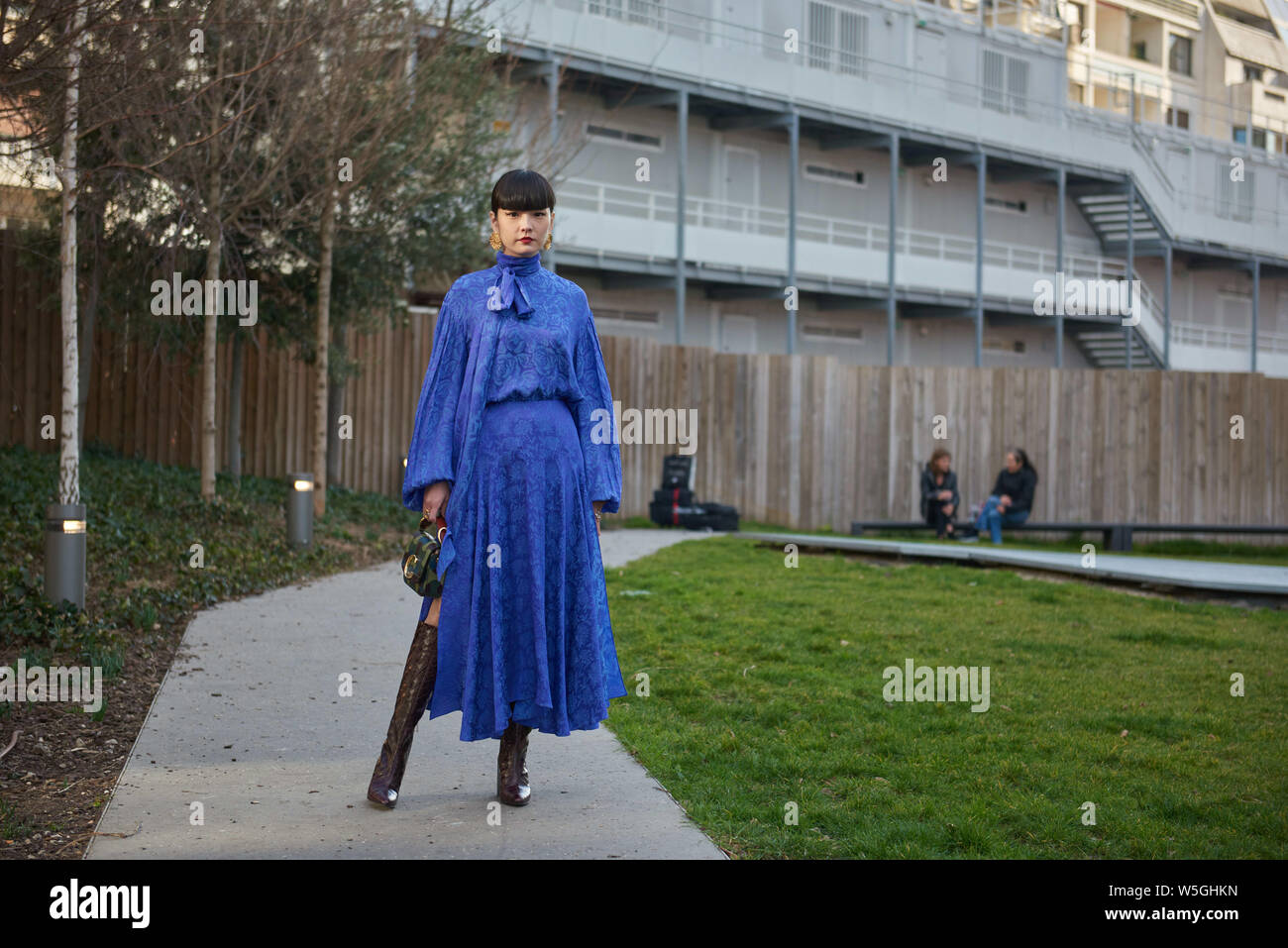 A trendy woman poses for street snaps during the Paris Fashion Week ...