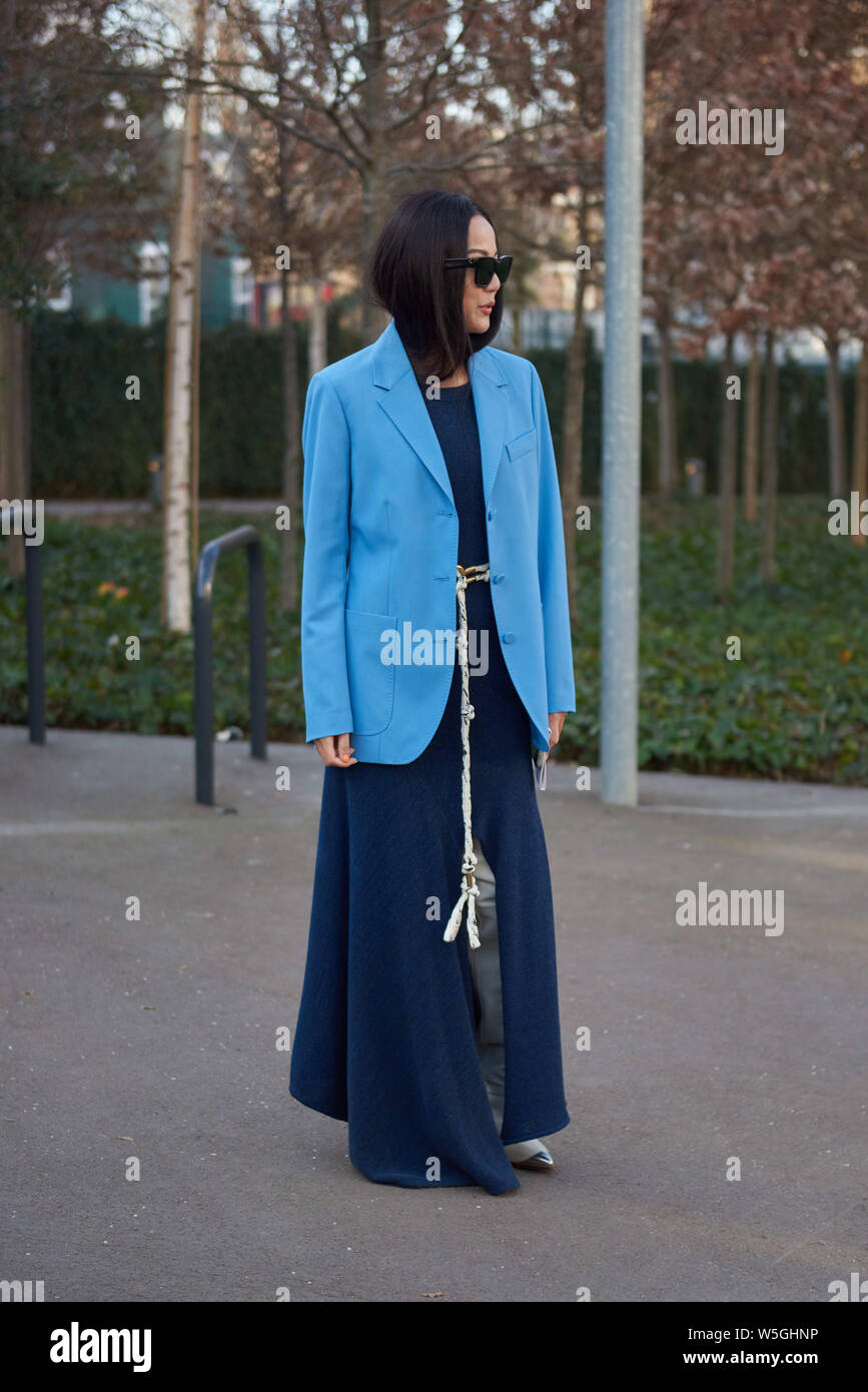 A trendy woman poses for street snaps during the Paris Fashion Week ...