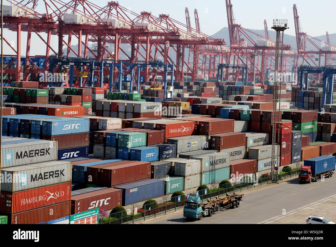 --FILE--Containers are stacked at the fully automated container terminal at a port in ...