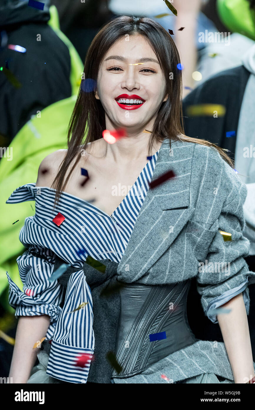 Chinese actress Qin Lan poses at the Solo Celeb. &HTDG show during the ...