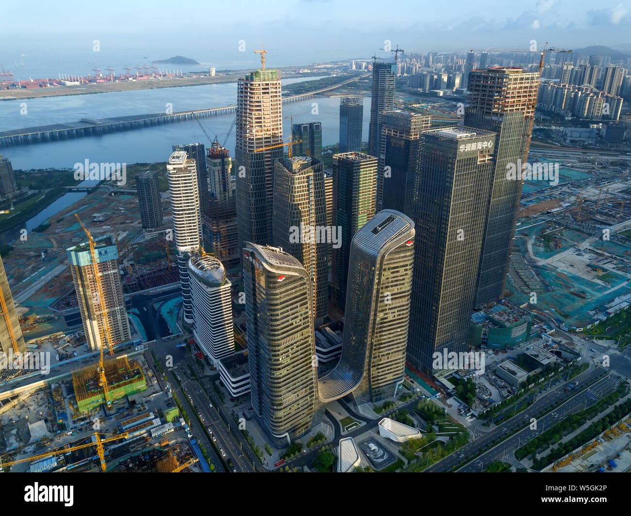 --FILE--New high-rise office buildings are under construction at ...
