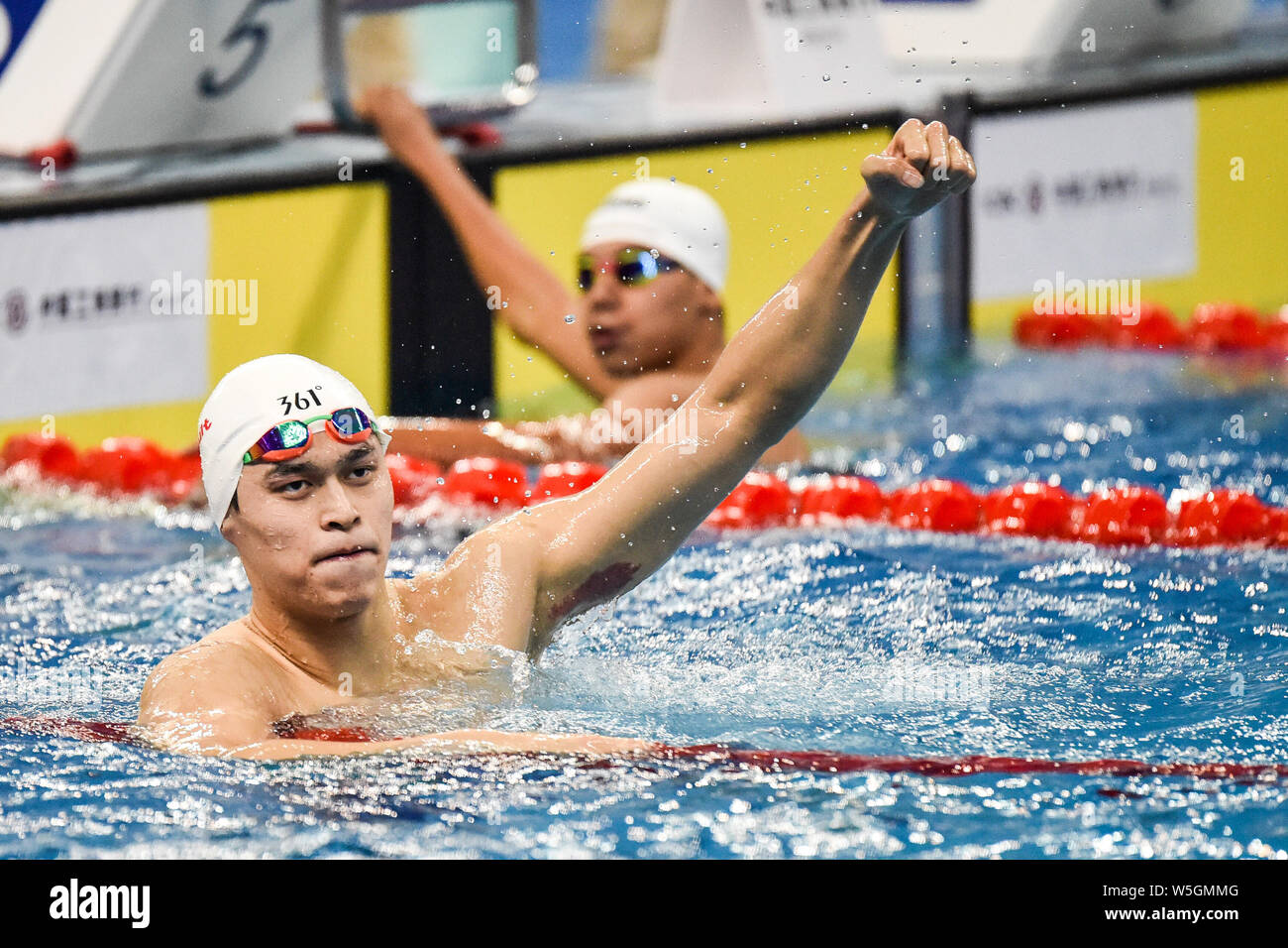 Chinese swimming Olympic champion Sun Yang reacts after winning the men ...