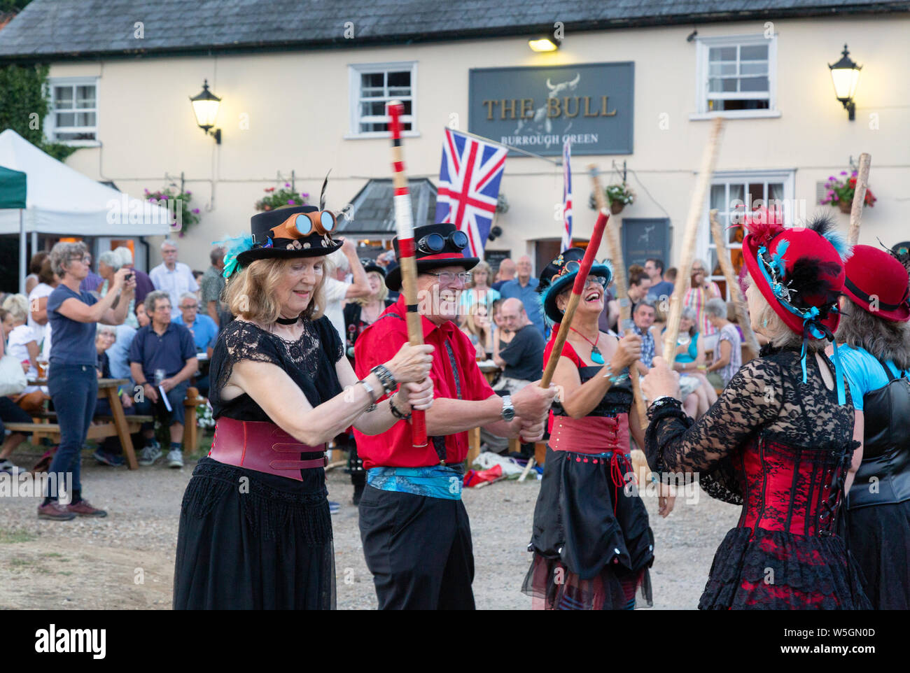 Border Morris Dance group SlackMaGirdle morris dancing outside The Bull ...