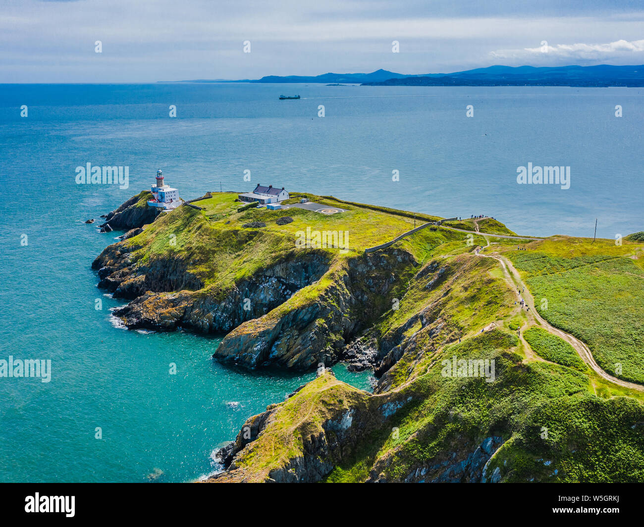 Aerial view Irish coastline in Howth, Dublin. Lighthouse aerial view ...