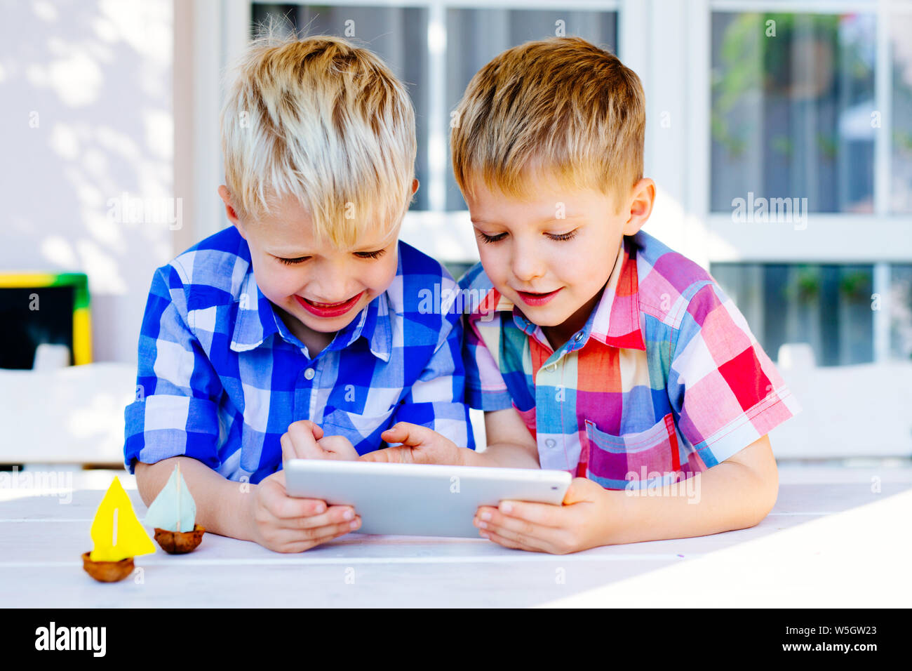 Smart brothers hi-res stock photography and images - Alamy
