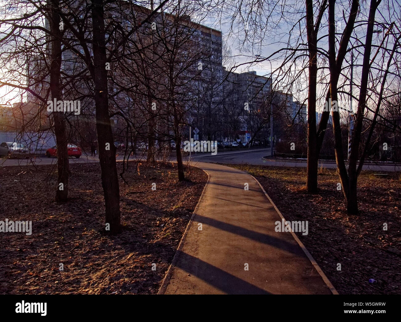Shadows on stone paved walkway hi-res stock photography and images - Alamy