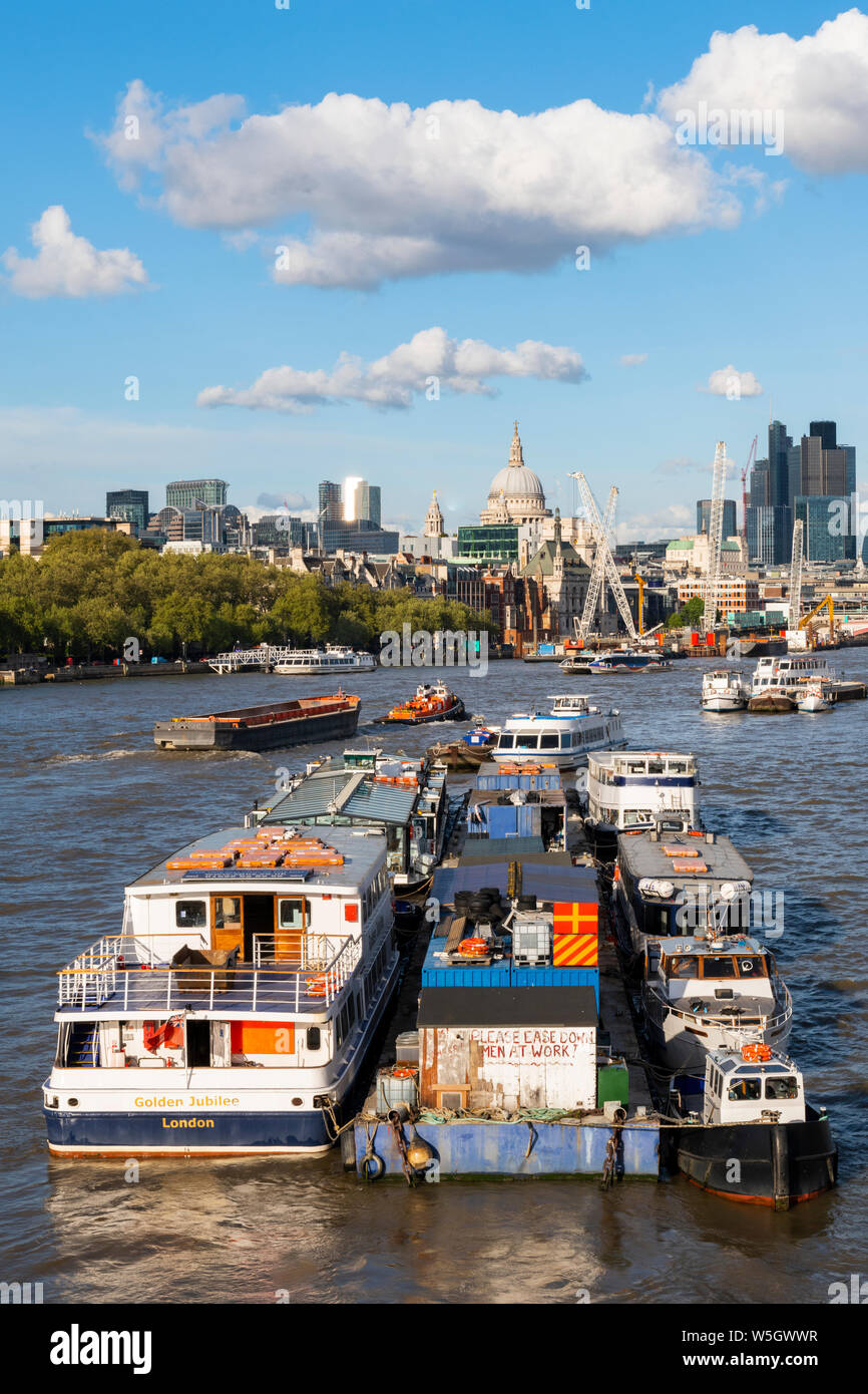 Boats on the River Thames, St. Paul's Cathedral and the City of London ...
