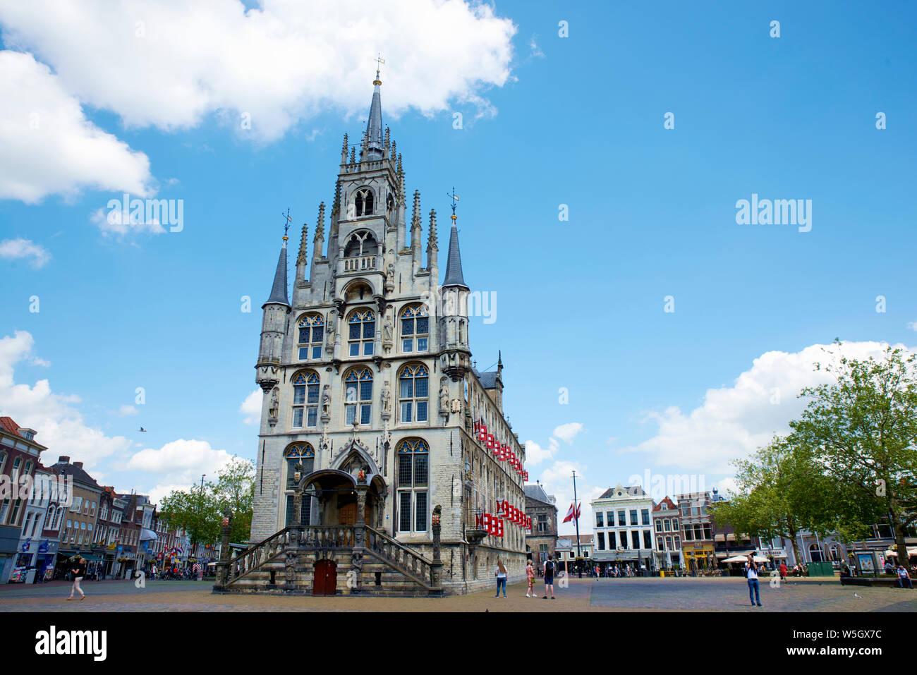 Street view of Gouda Town Hall on market square Stock Photo - Alamy