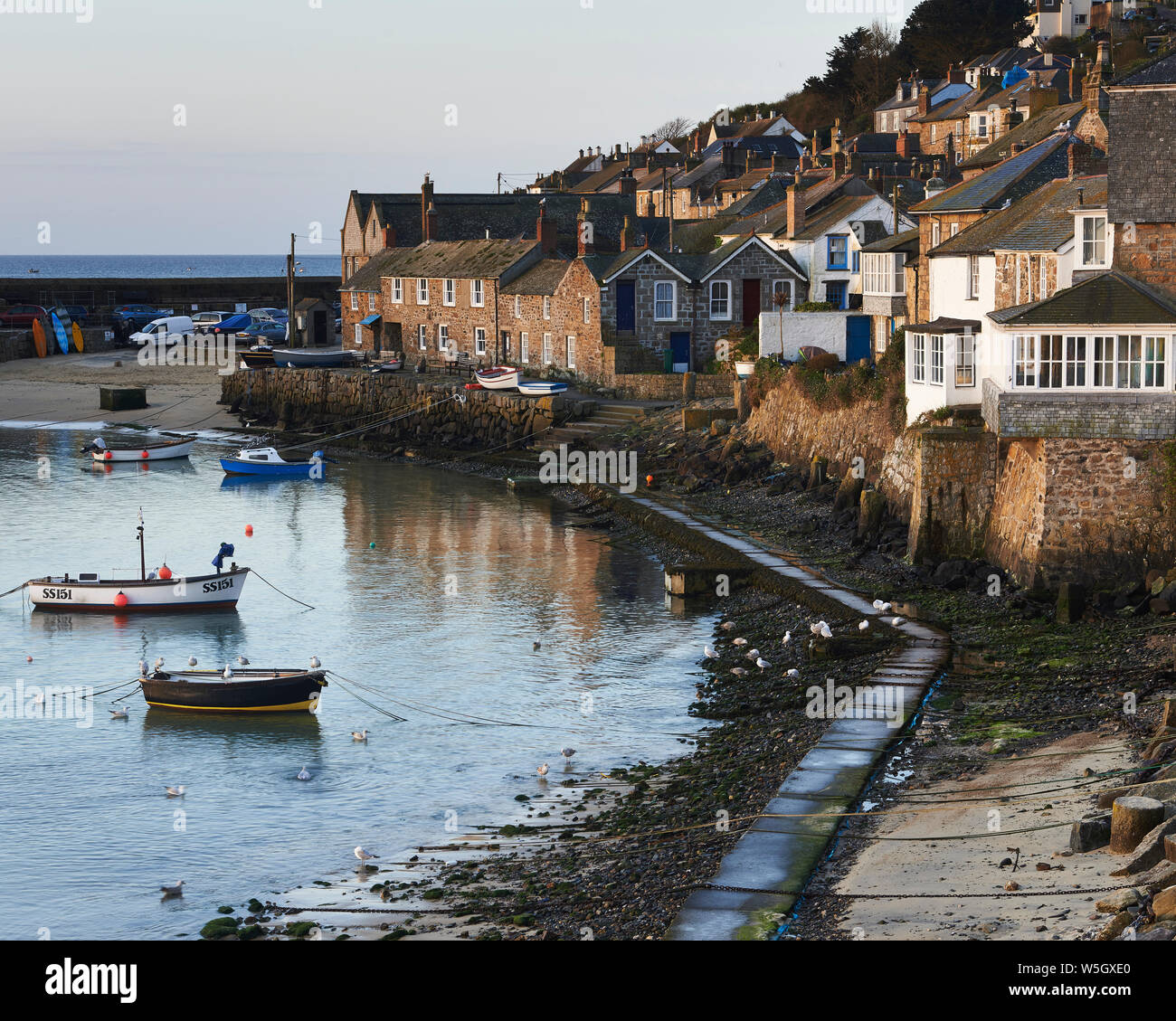 The picturesque fishing village of Mousehole, Cornwall, England, United ...
