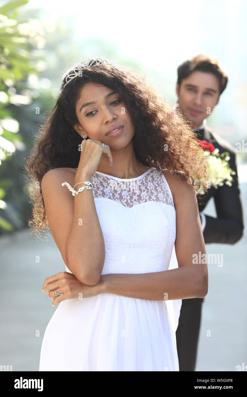 Pensive bride and groom hi-res stock photography and images - Alamy