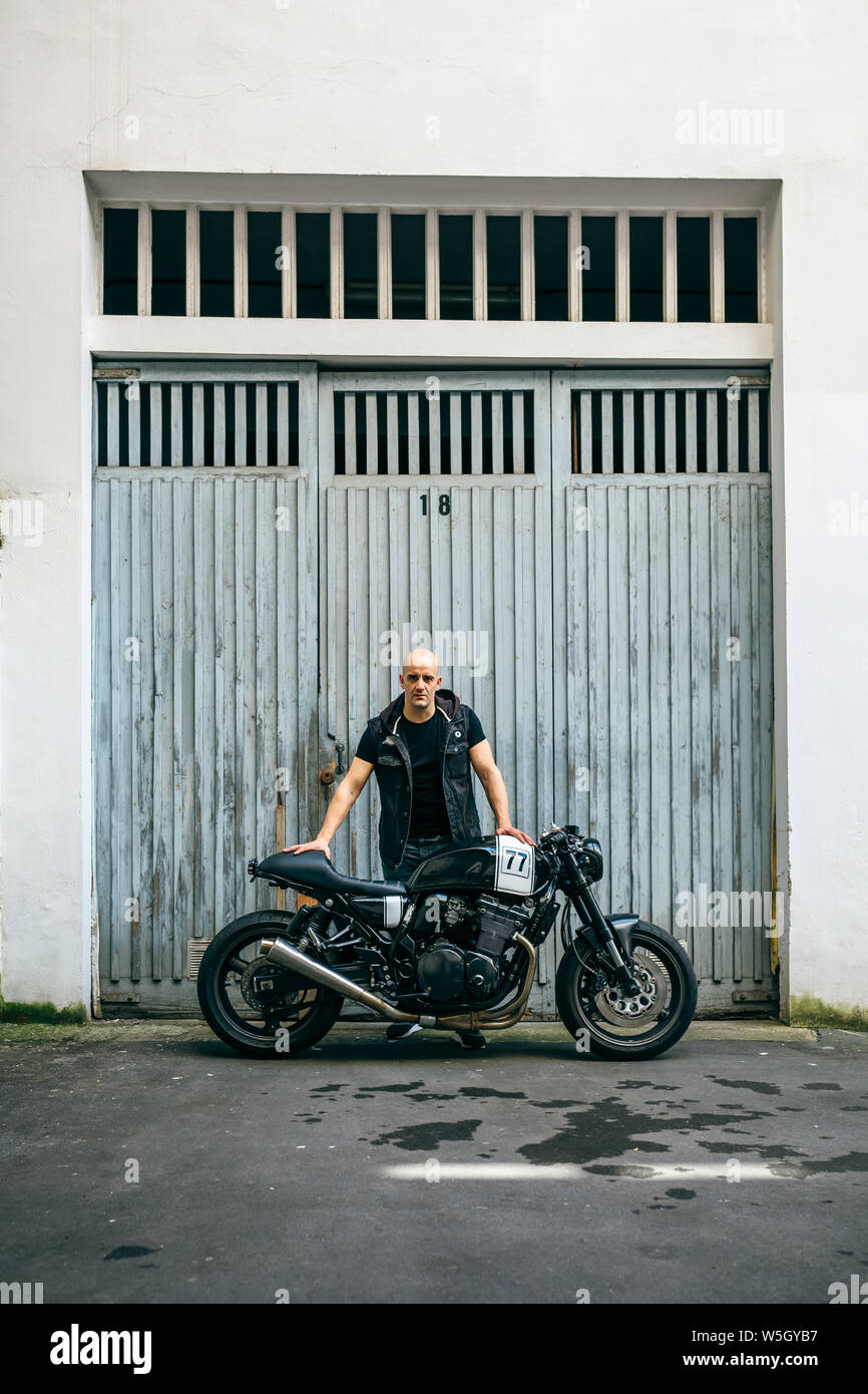 Man posing motorcycle hi-res stock photography and images - Alamy