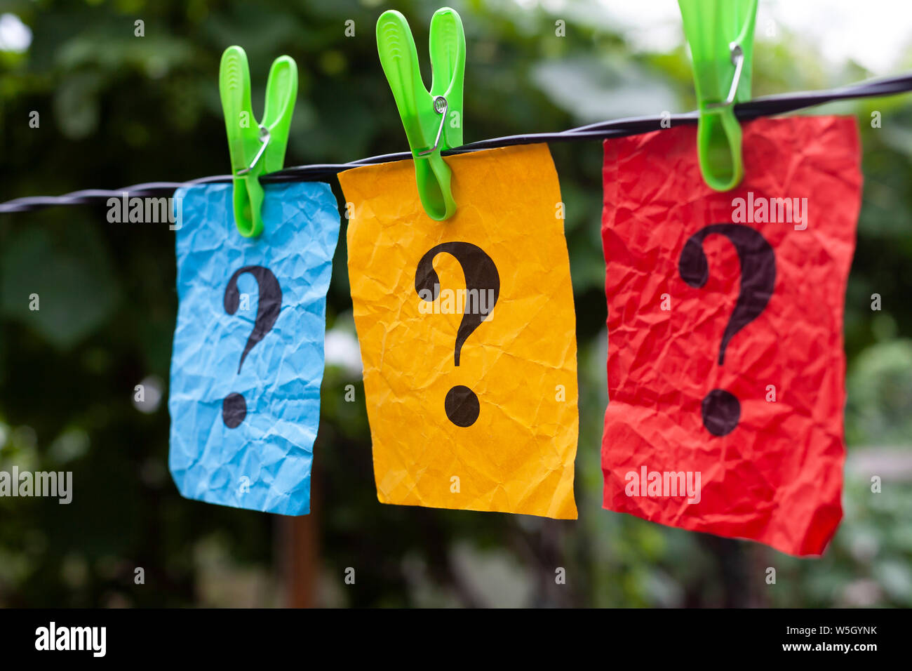 Colorful question marks hanging on a clothesline. Close up. Concept ...