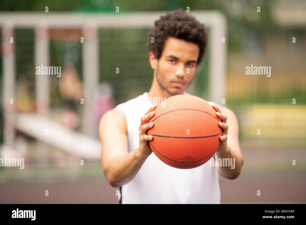 Hands of young contemporary active basketball player passing ball Stock ...