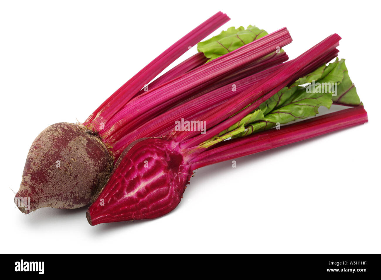 Fresh red beet roots and stalks isolated on white background Stock ...