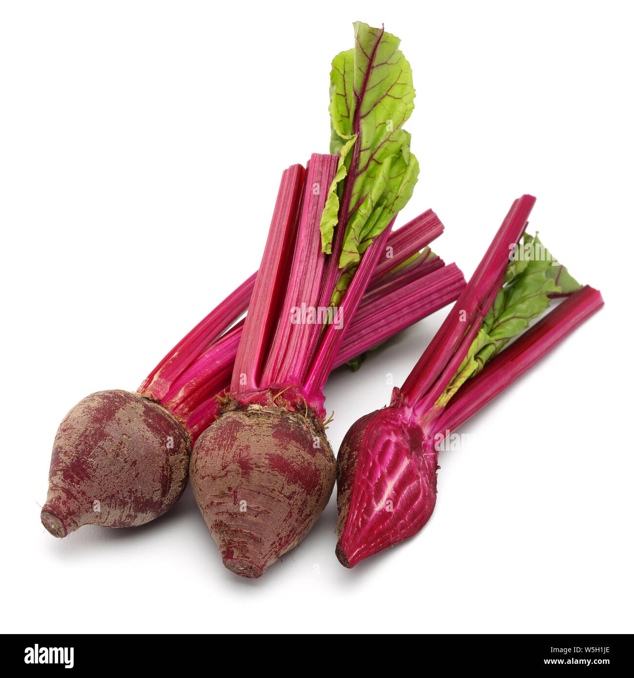 Fresh red beet roots and stalks isolated on white background Stock ...