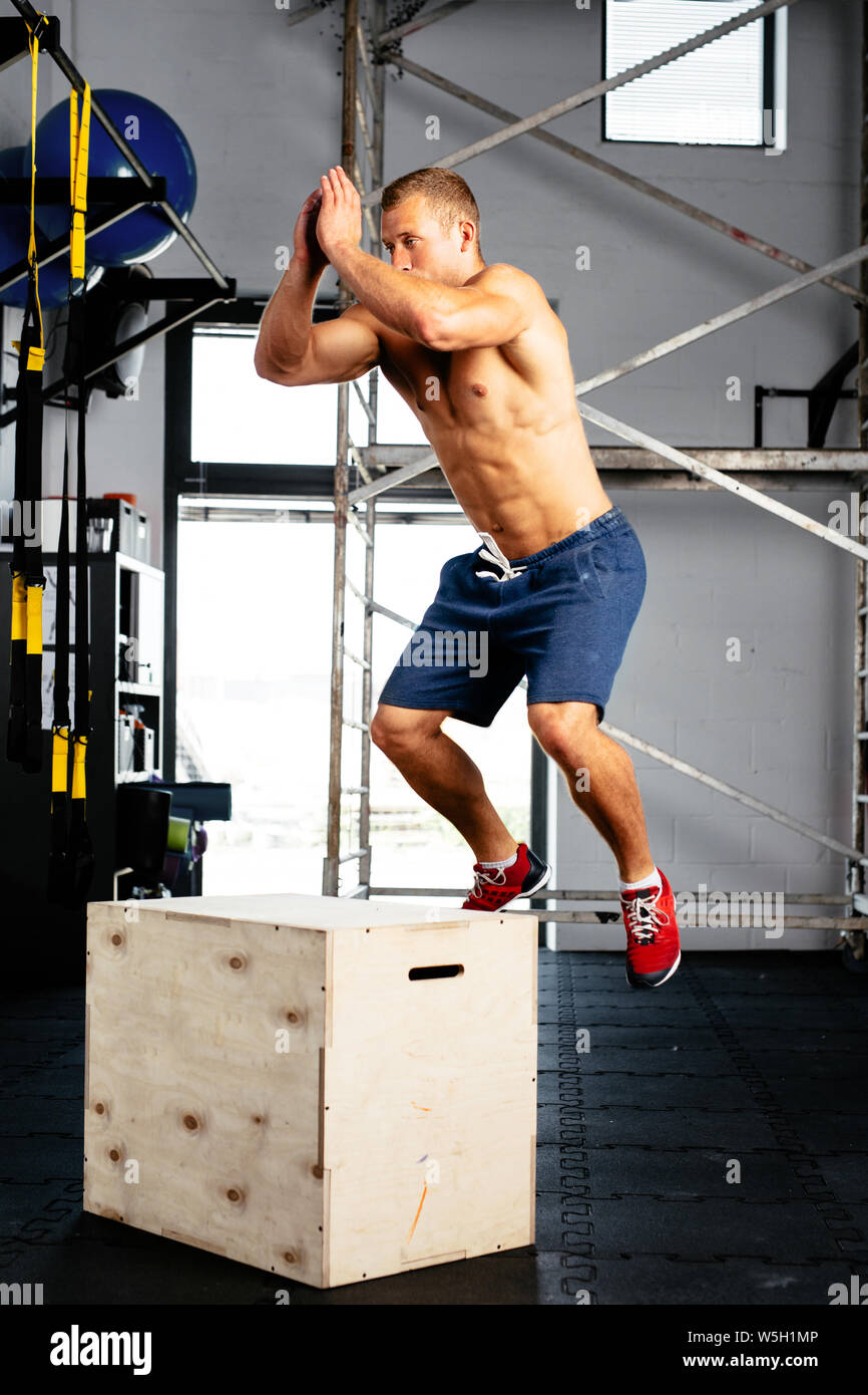Muscular sportsman jump in fitness hi-res stock photography and images ...
