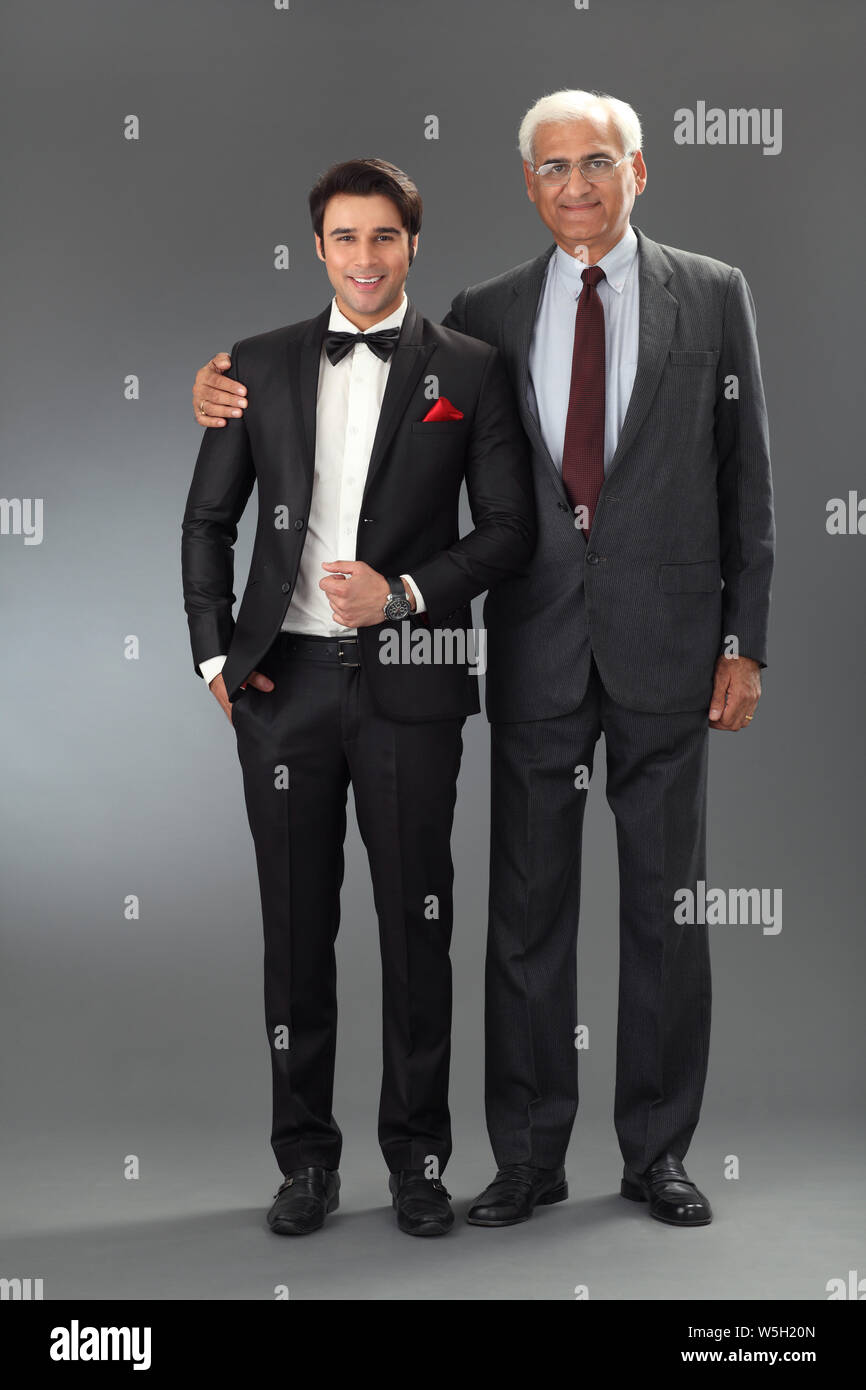 Groom with his father standing together Stock Photo - Alamy