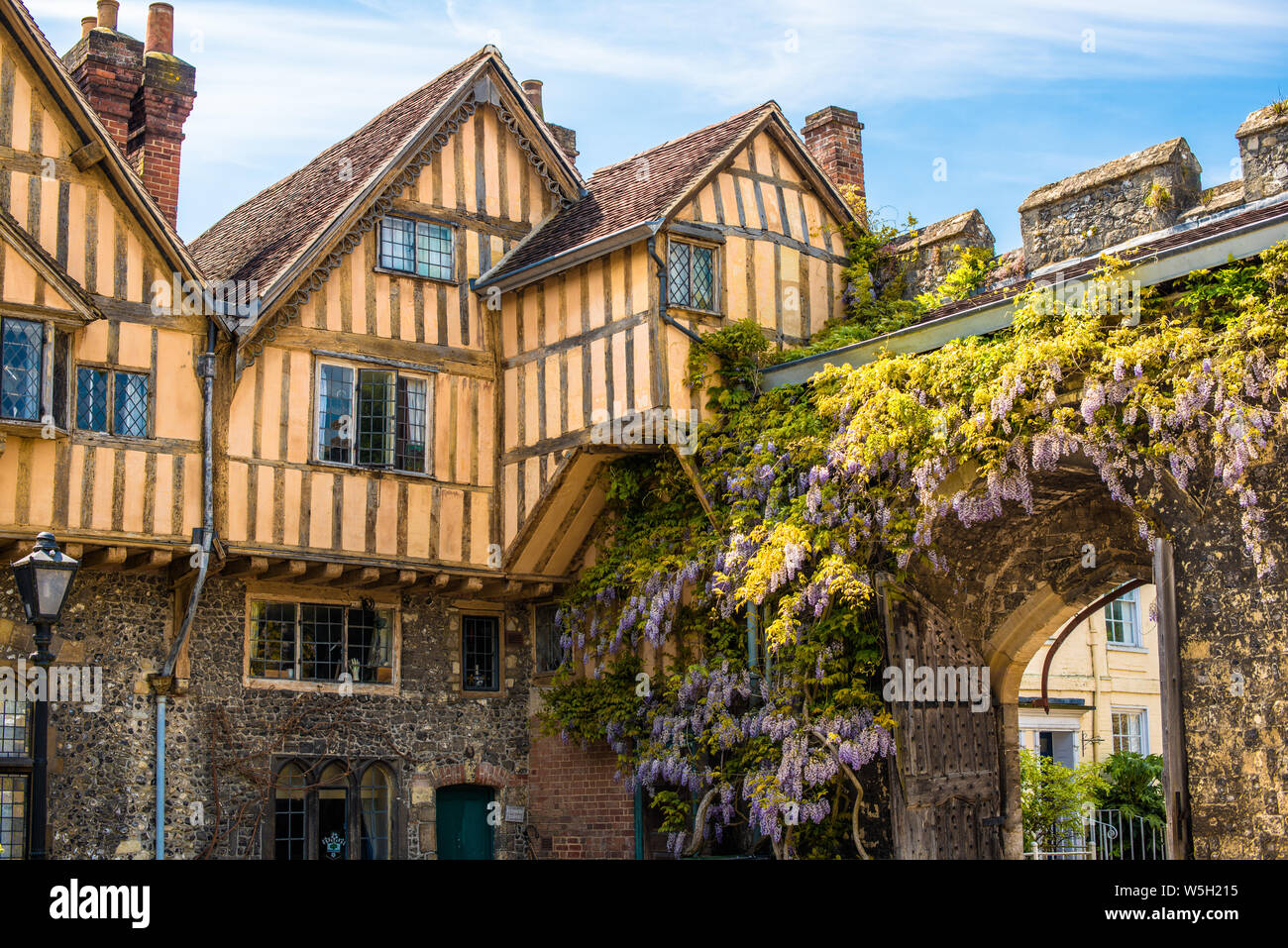 Priory Gate and Tudor buildings of Cheyney Court next to Winchester ...