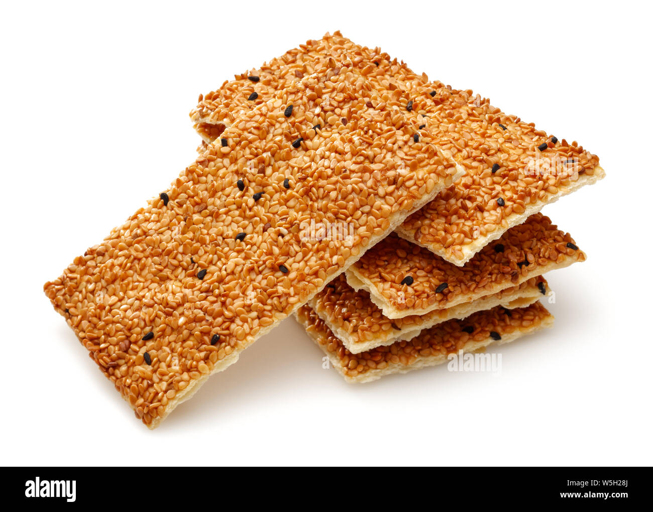 Sesame seed crackers isolated on white background Stock Photo - Alamy