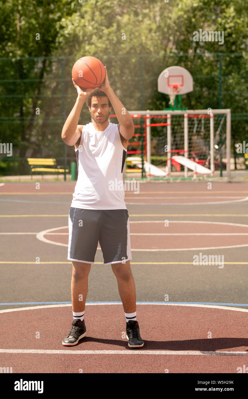 Ball over his head hi-res stock photography and images - Alamy