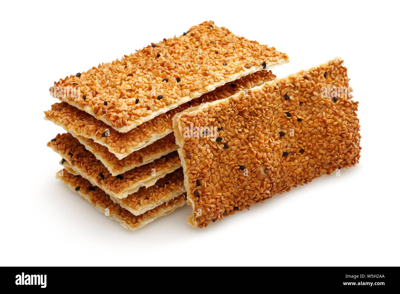 Sesame seed crackers isolated on white background Stock Photo - Alamy