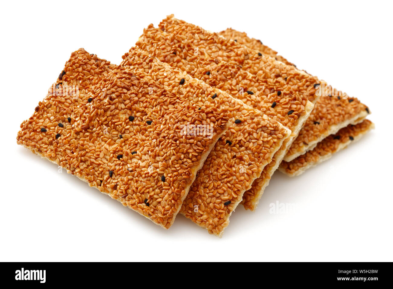 Sesame seed crackers isolated on white background Stock Photo - Alamy