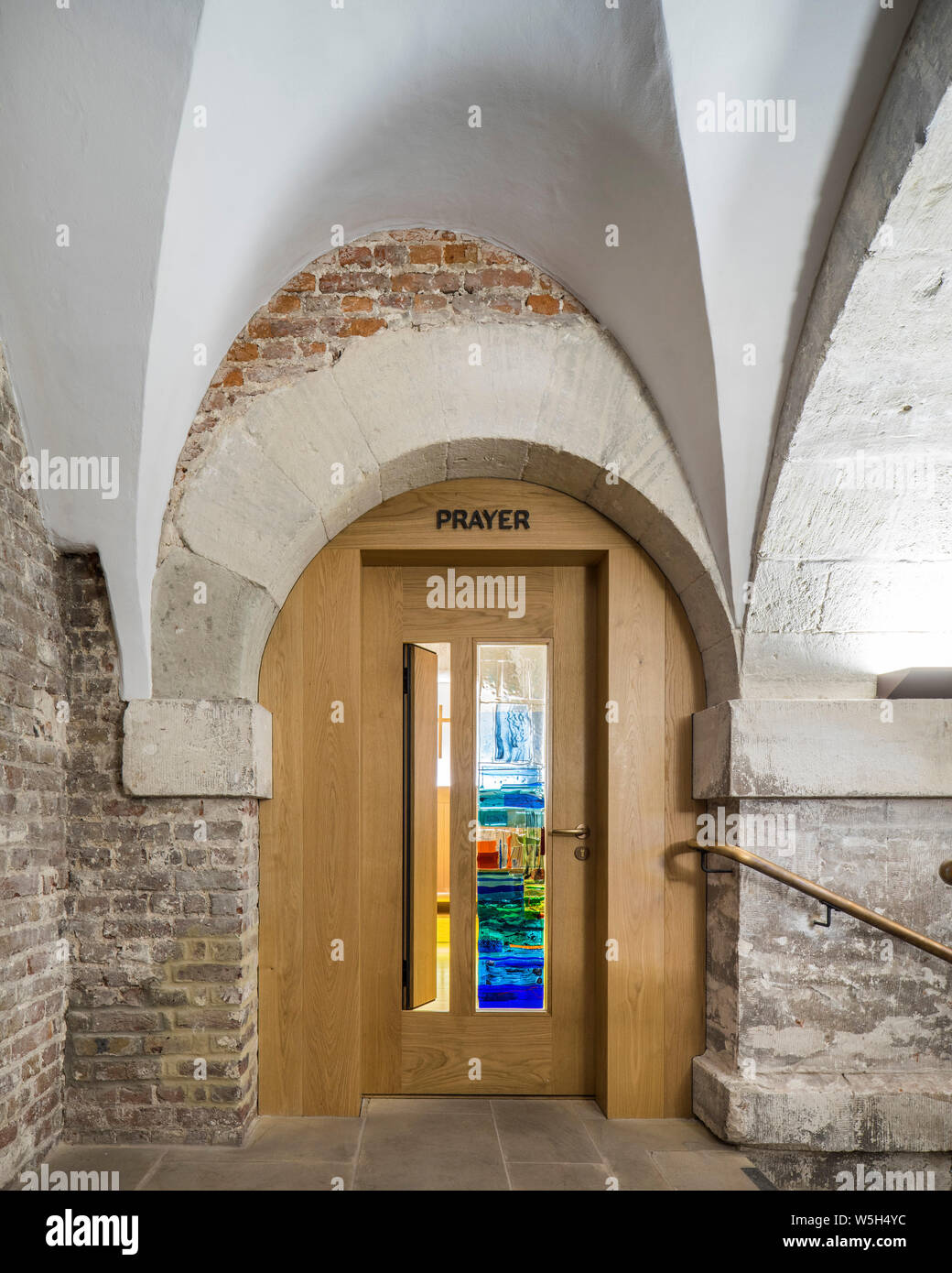 Entrance door to prayer room with staines glass. Crypt of Christ Church ...