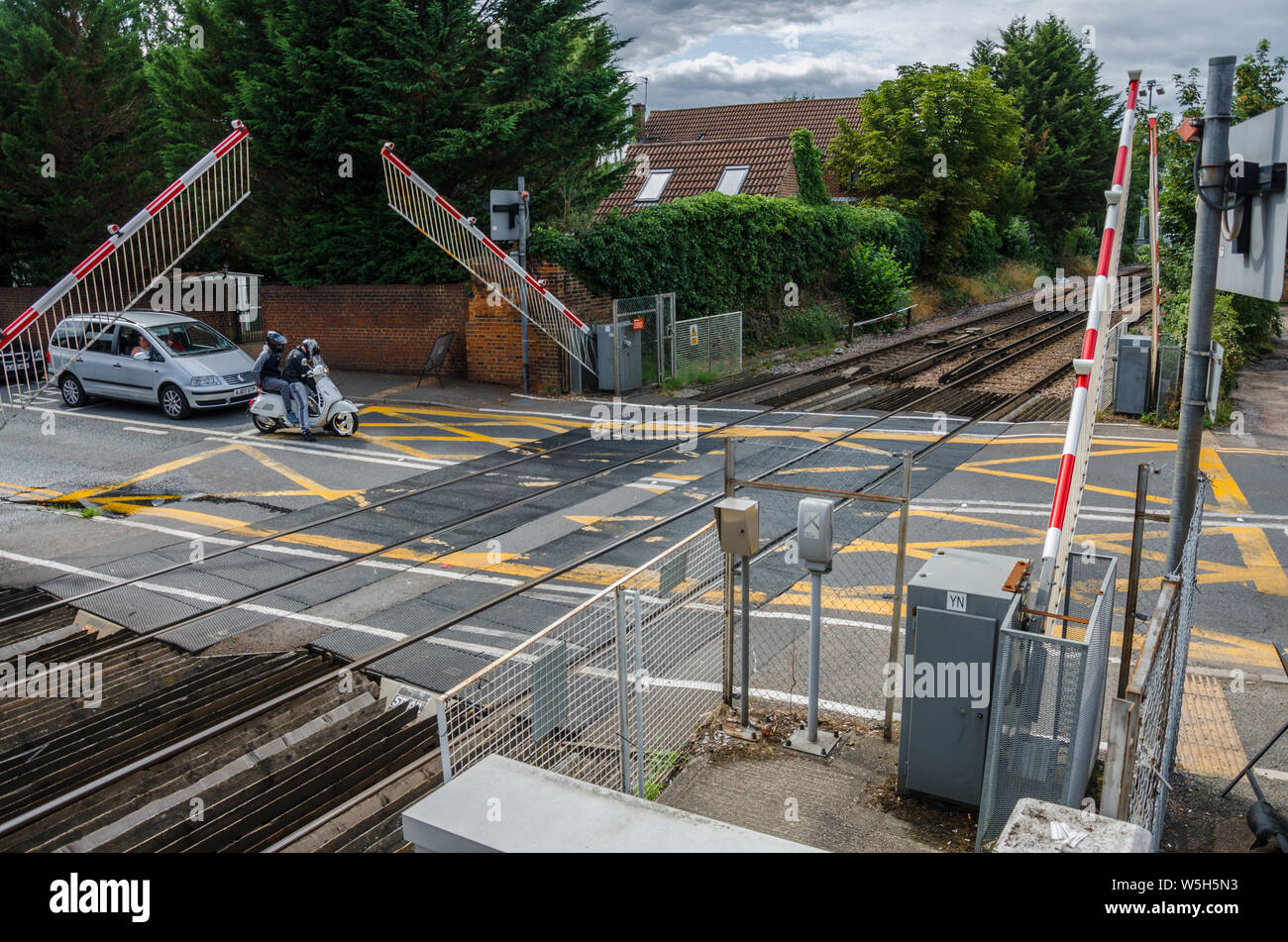 Barriers which block road traffic are rising to allow traffic to flow ...