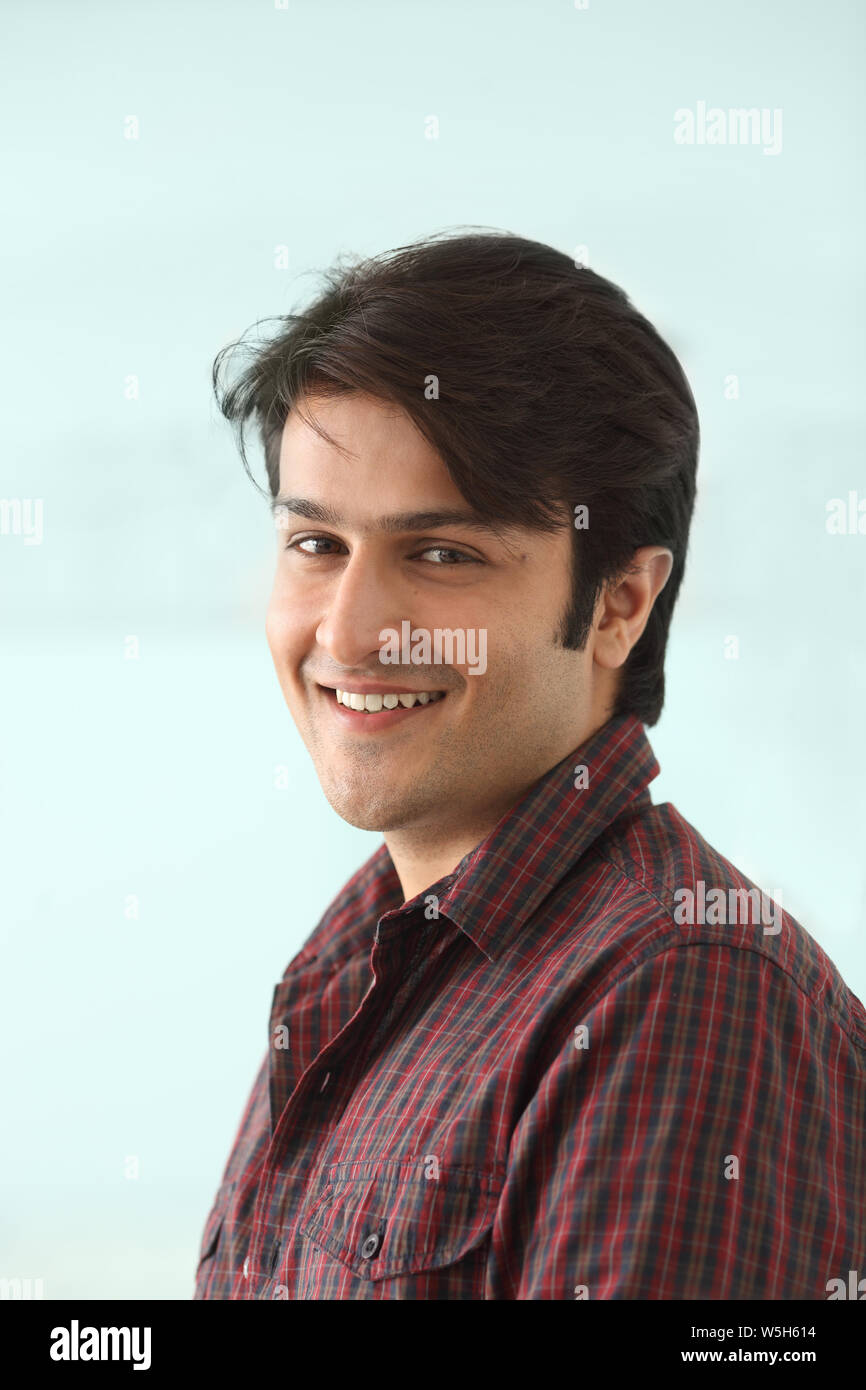 Side profile of a man smiling Stock Photo - Alamy