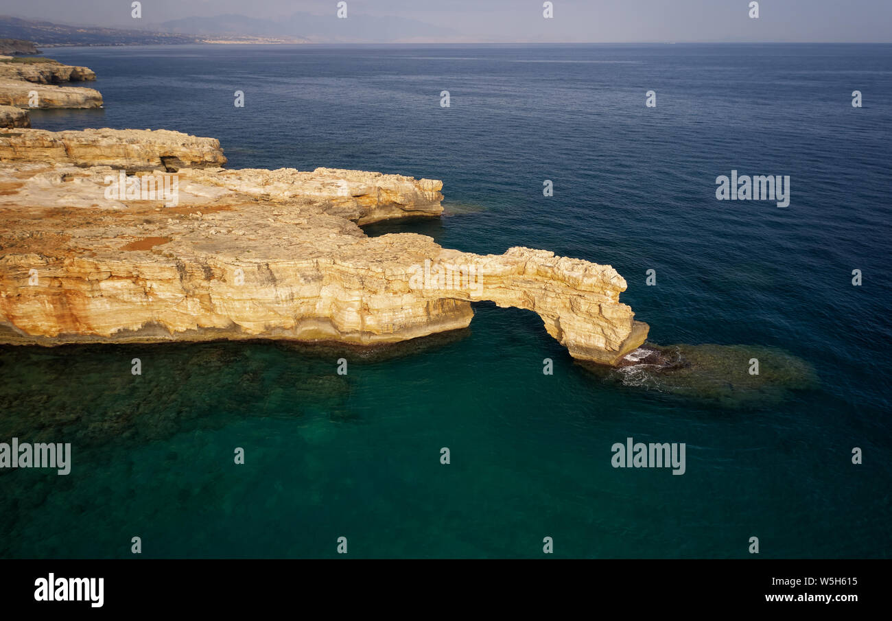 Aerial view from drone on stone arch Kamara and coastal rocks near ...