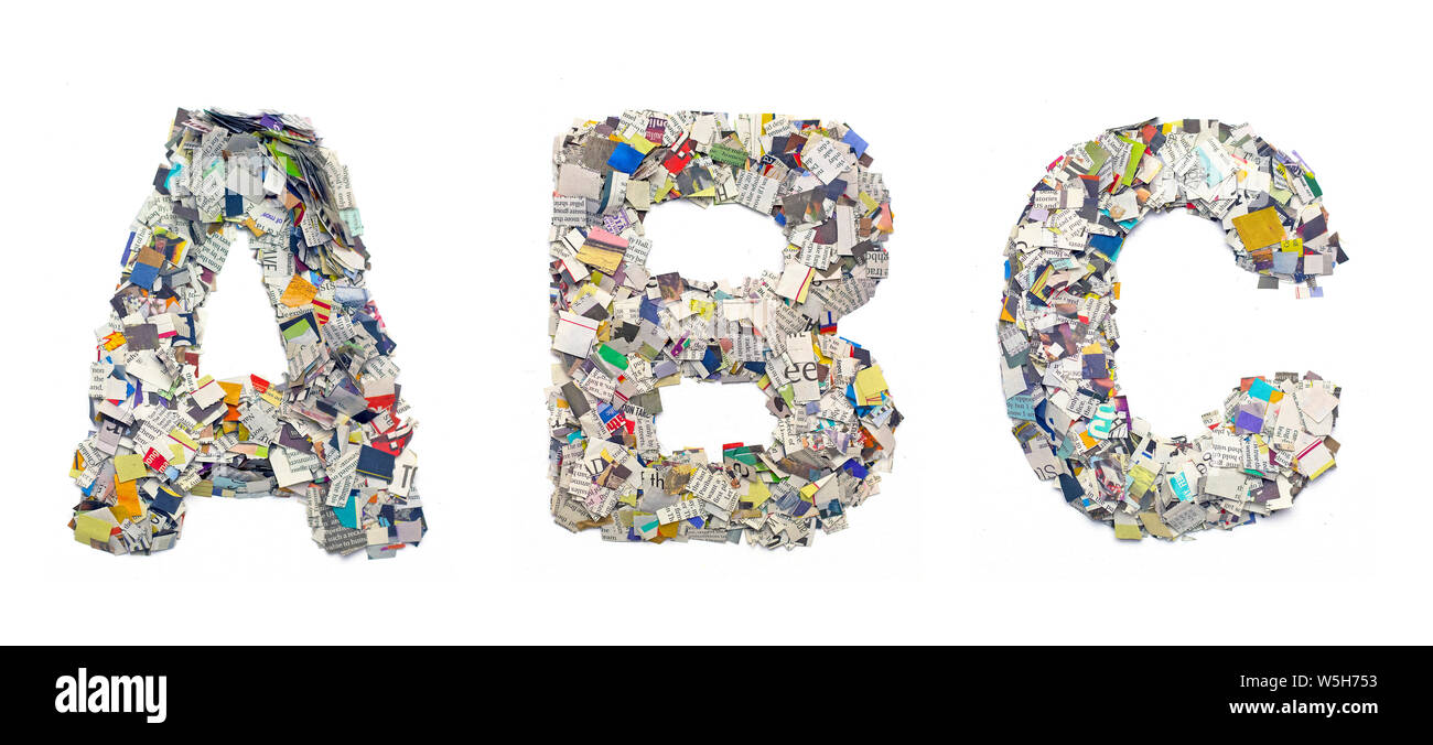 ABC letters made up of color newspaper isolated on white Stock Photo ...