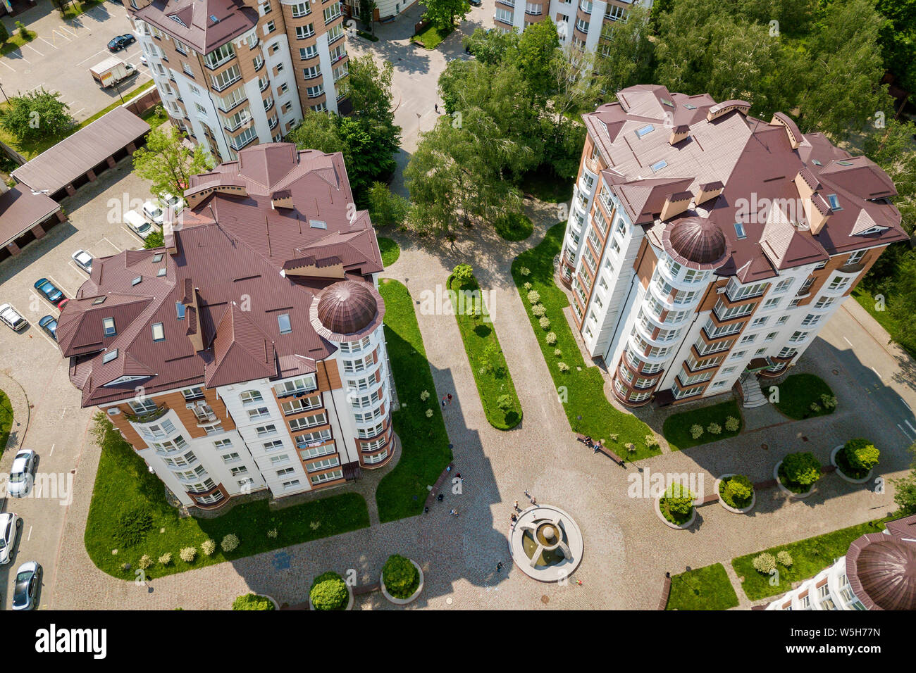 Top view of apartment or office tall buildings, parked cars, urban city ...