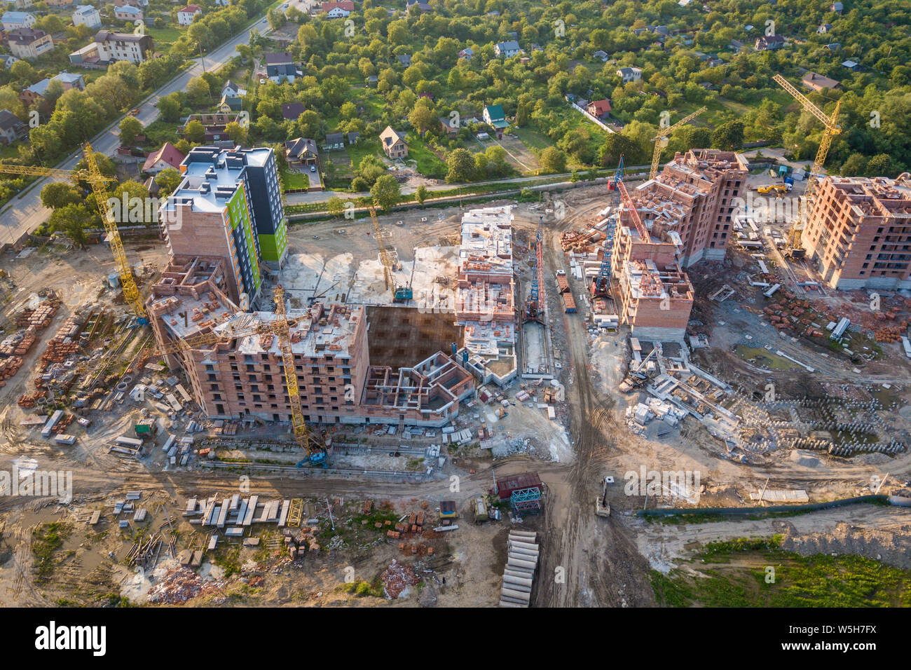 Apartment or office brick buildings under construction, top view ...