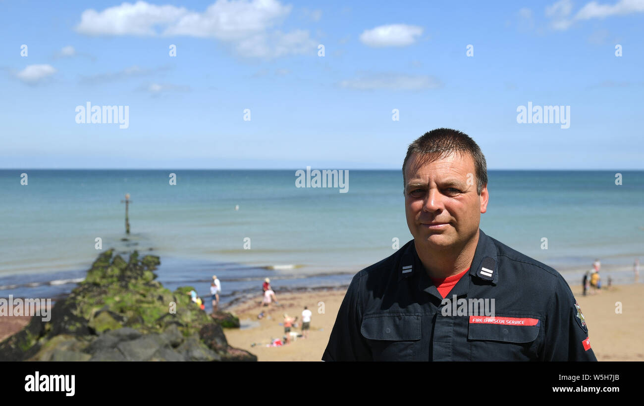 Norfolk Fire and Rescue Service crew manager Russell Cox by the rocks ...