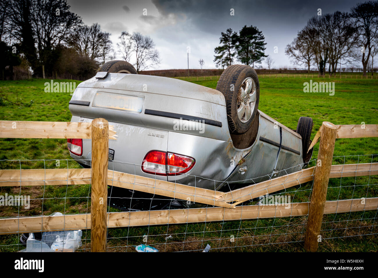 Car crash. Young drivers overturned vehicle. Non fatal accident caused ...