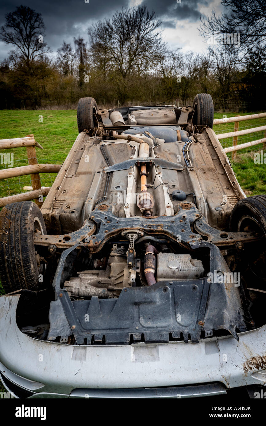 Car crash. Young drivers overturned vehicle. Non fatal accident caused ...