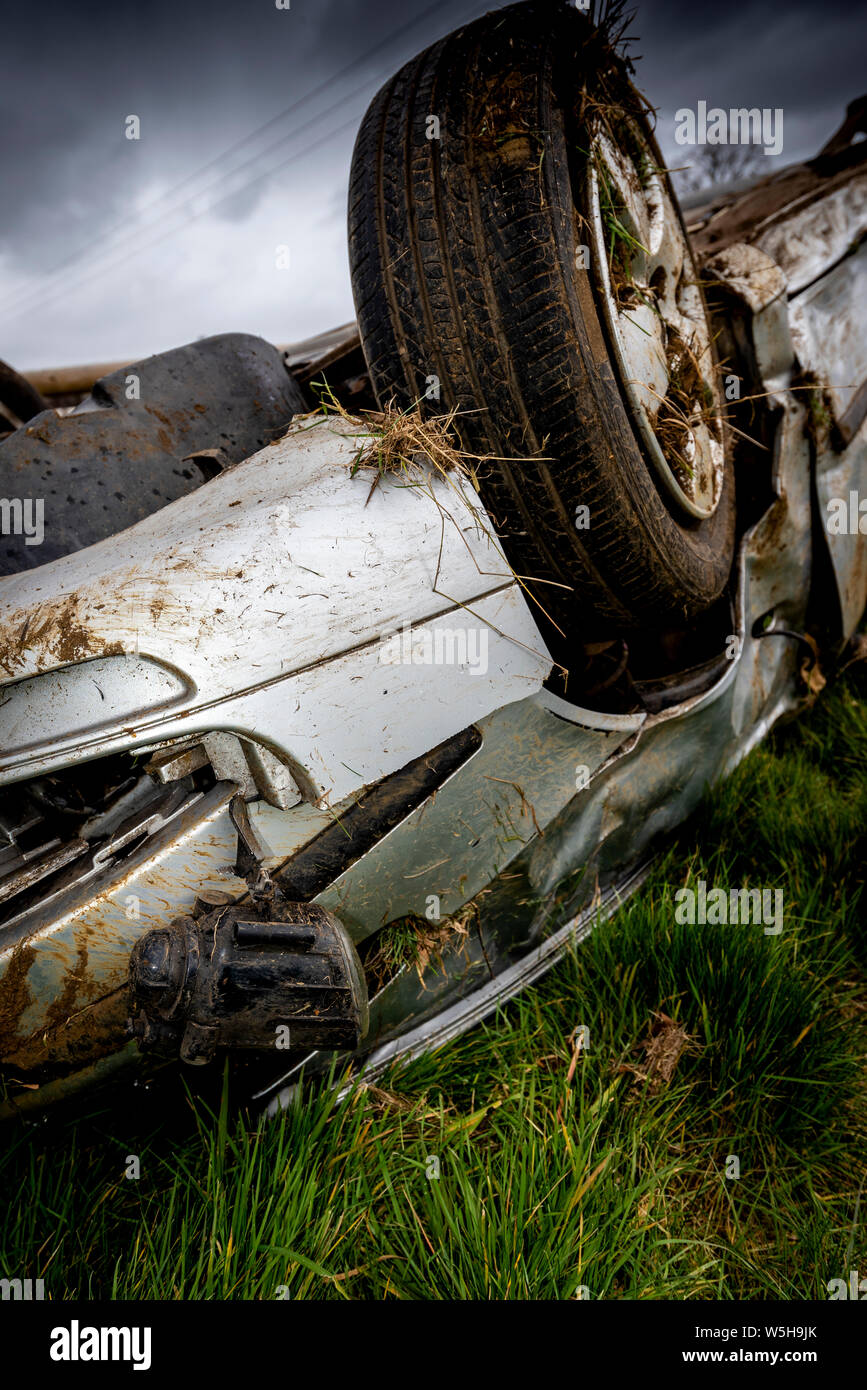 Car crash. Young drivers overturned vehicle. Non fatal accident caused ...