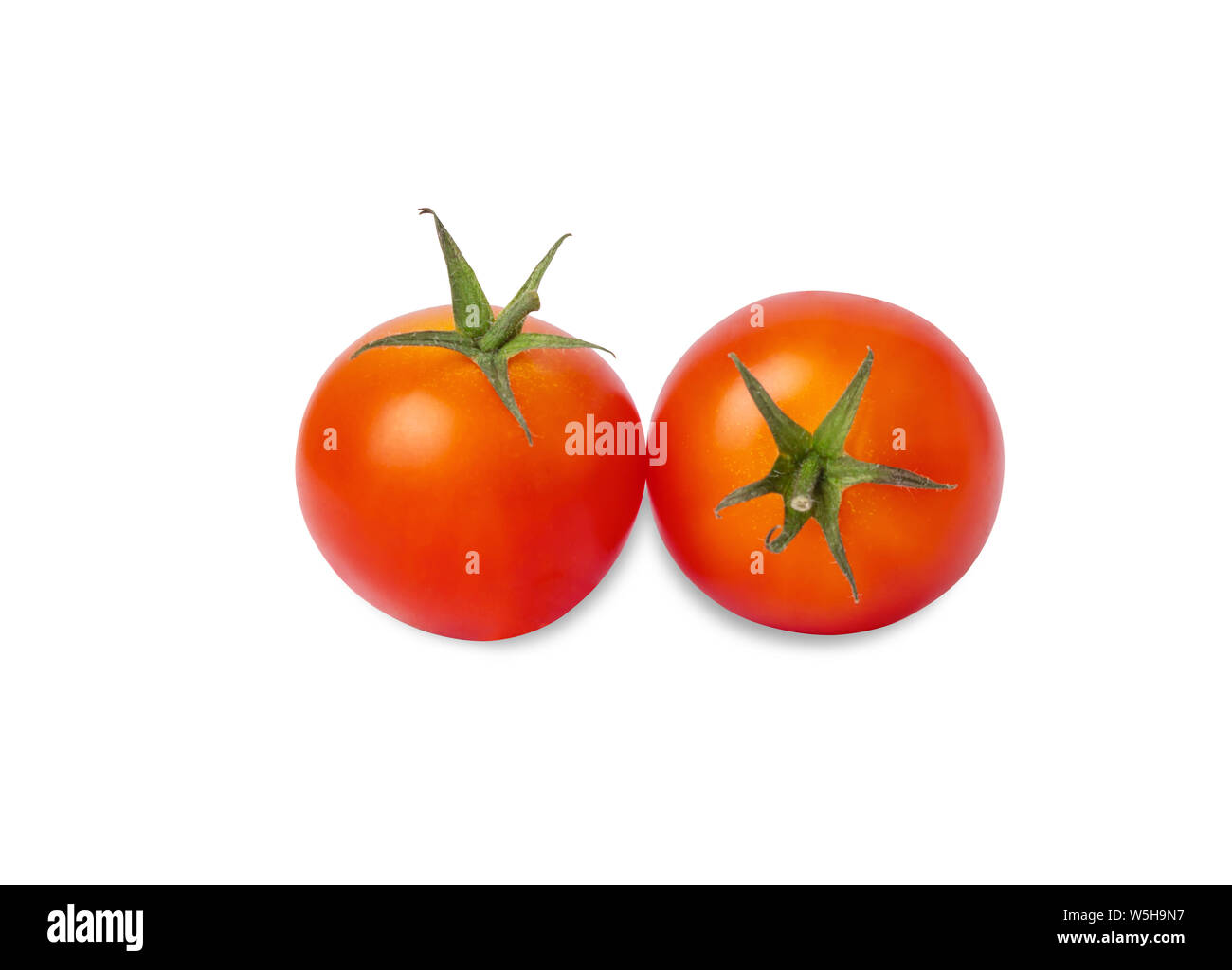 two red tomatoes isolated on the white background. Cherry tomato is a ...