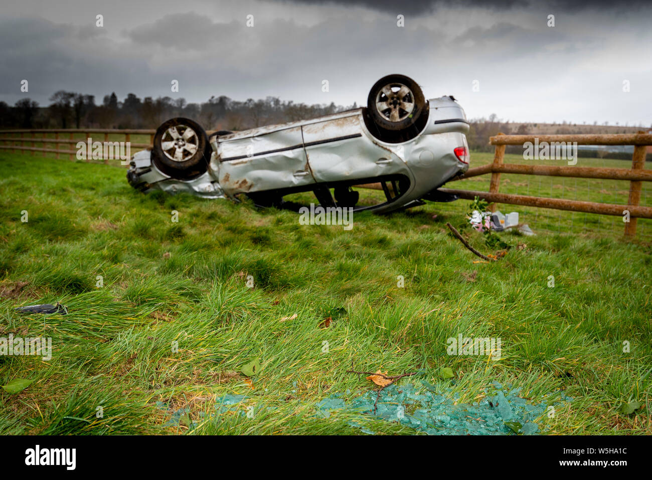 Car crash. Young drivers overturned vehicle. Non fatal accident caused ...