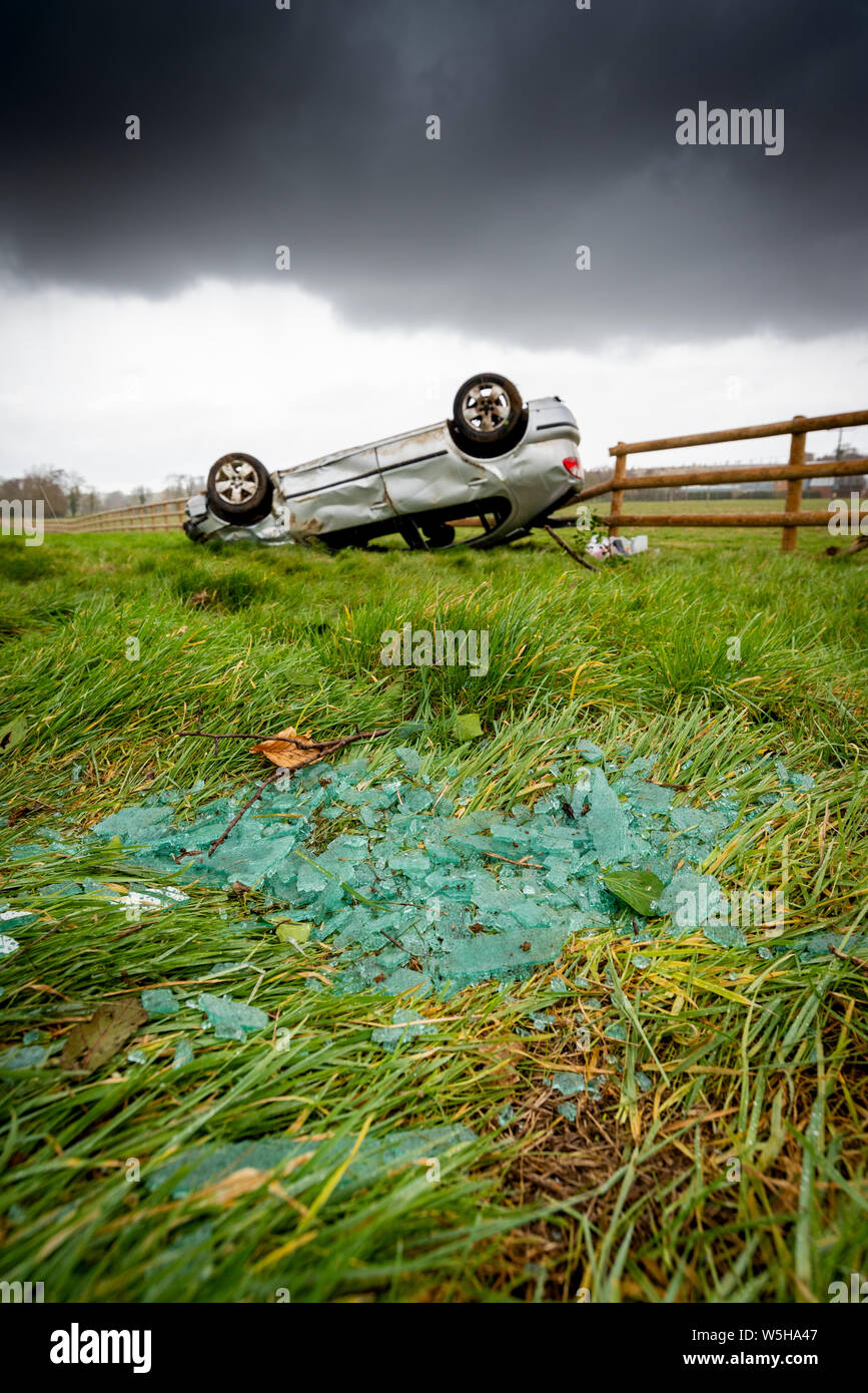 Car crash. Young drivers overturned vehicle. Non fatal accident caused ...