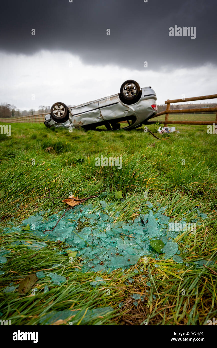 Car crash. Young drivers overturned vehicle. Non fatal accident caused ...